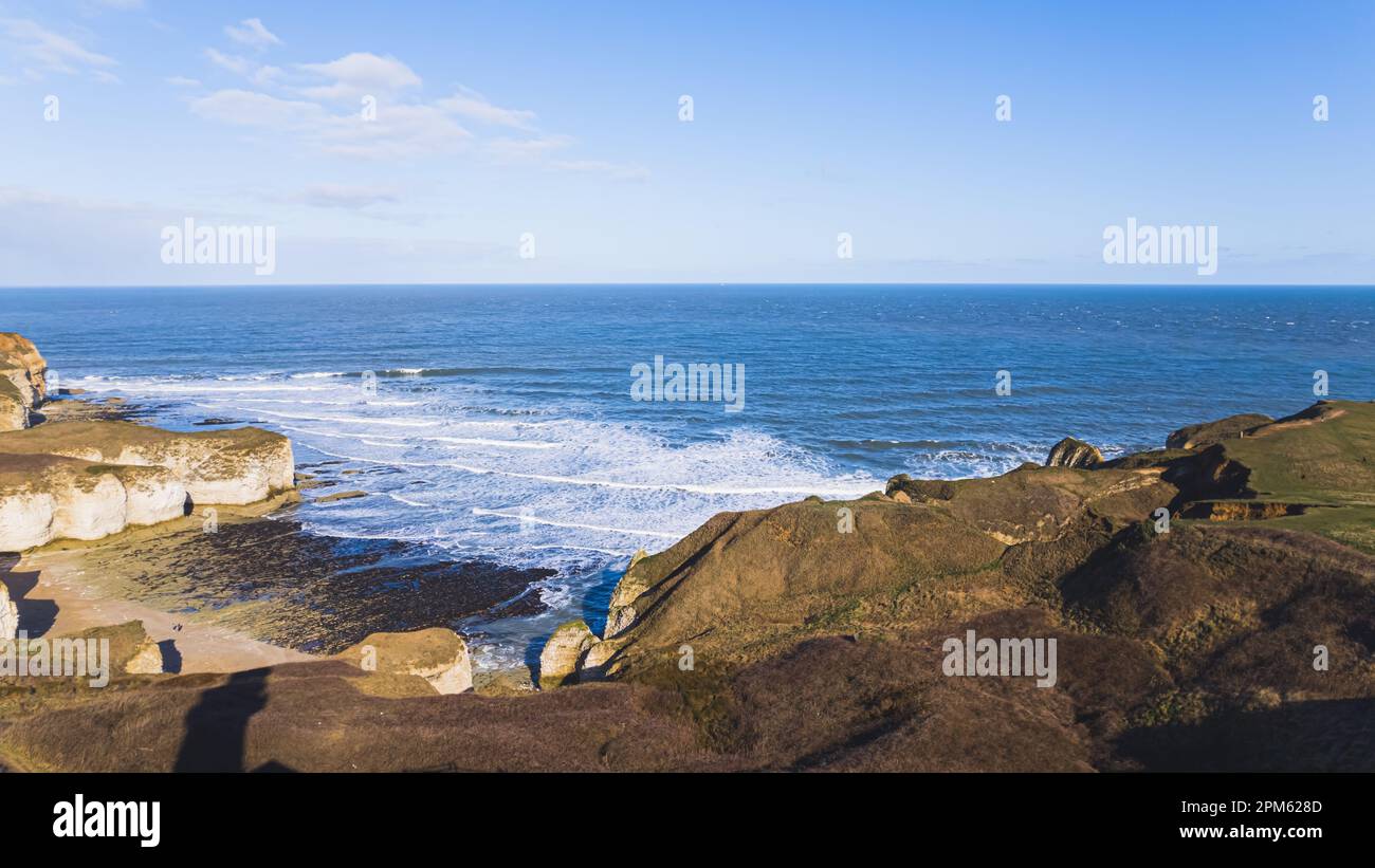 View of the wavy North Sea from Flamborough Head chalk cliffs ...
