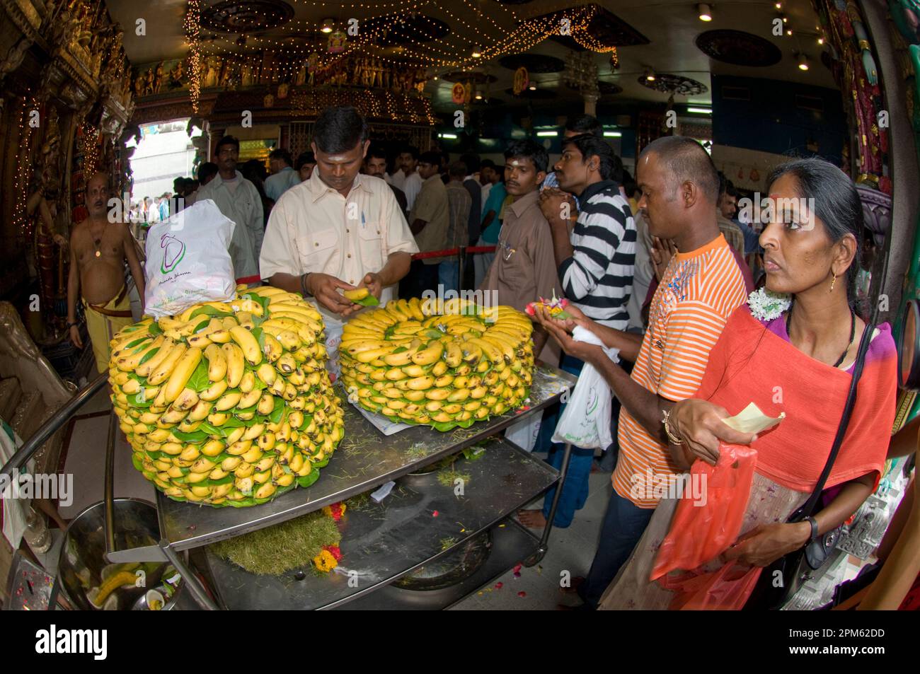 Man selling banana offering to devotees at Deepavali ceremony, Sri ...