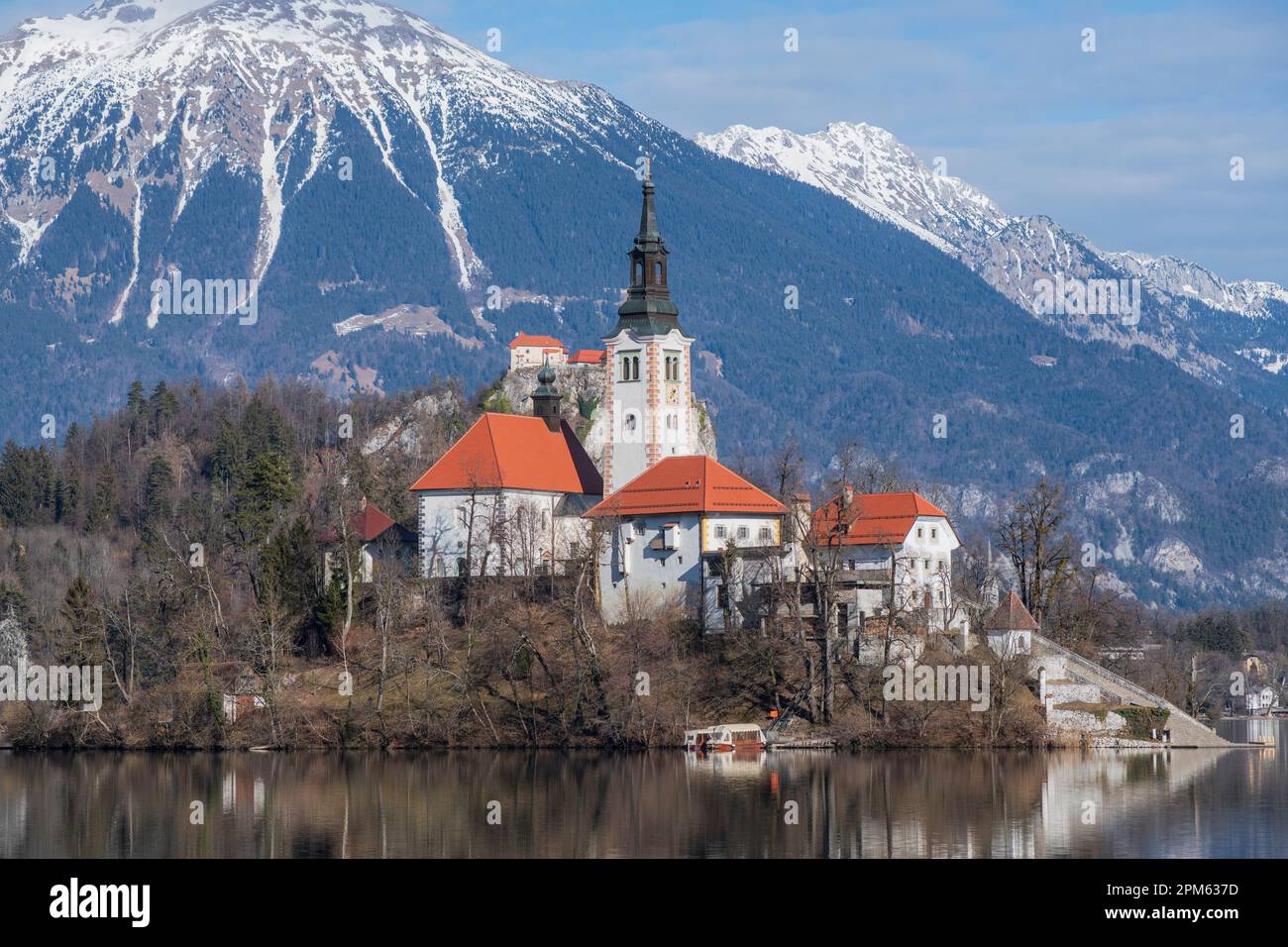 Lake Bled: Church of the Mother of God, and Bled Castle, with snowed ...