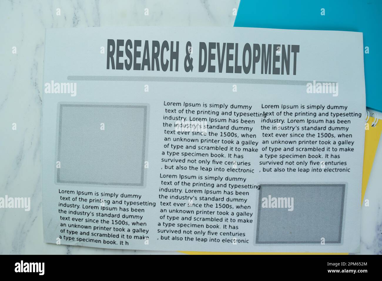 Research and Development text in headline isolated on office desk ...