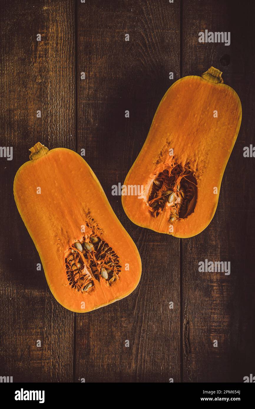 Fresh butternut squash chopped in half Stock Photo - Alamy