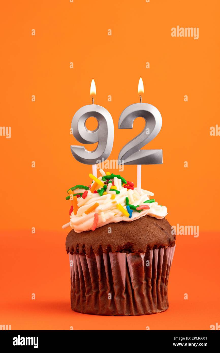 Birthday cake with candle number 92 - Orange foamy background Stock ...