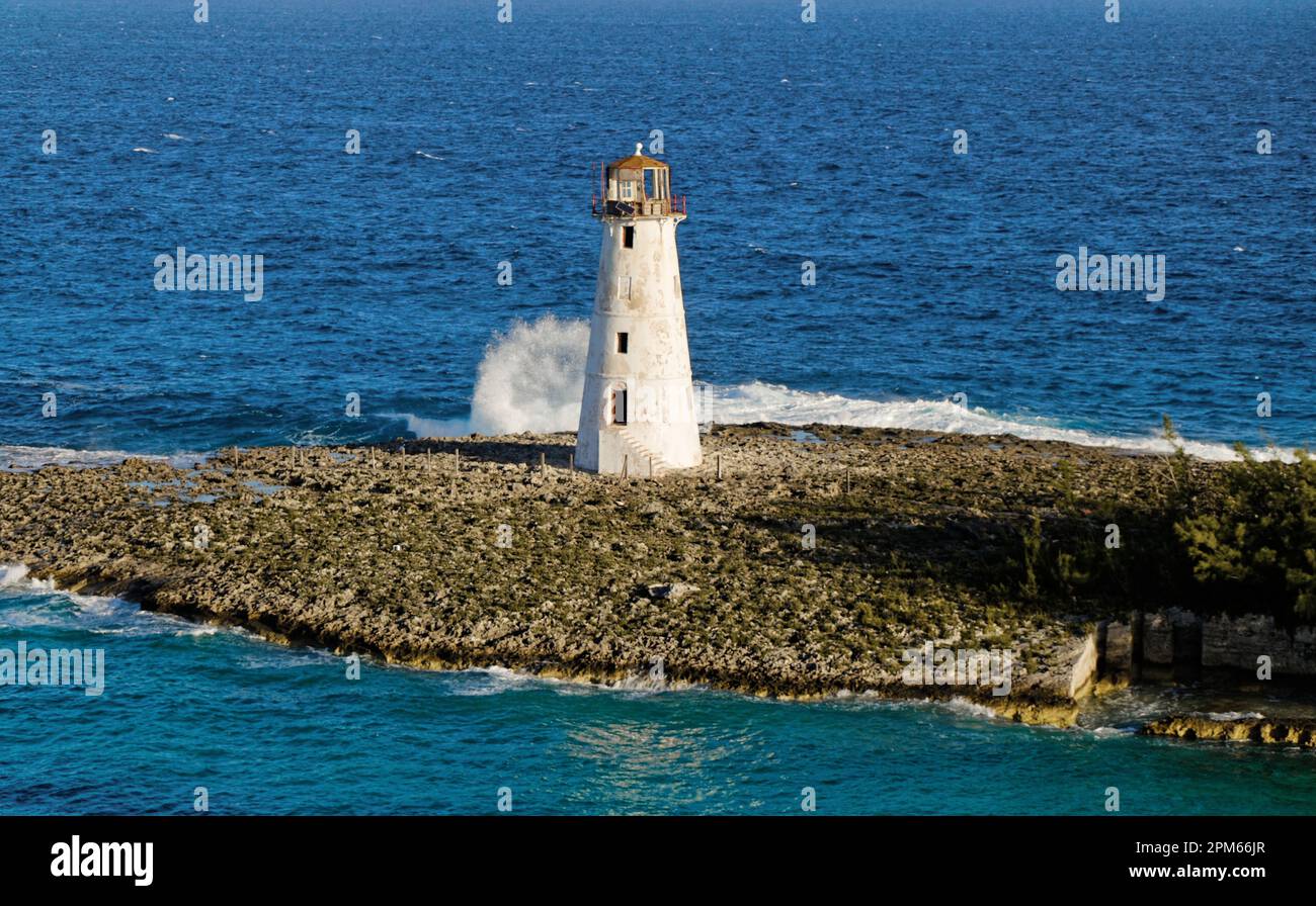 An old lighthouse on a point of land in the Bahamas near Nassau Stock ...