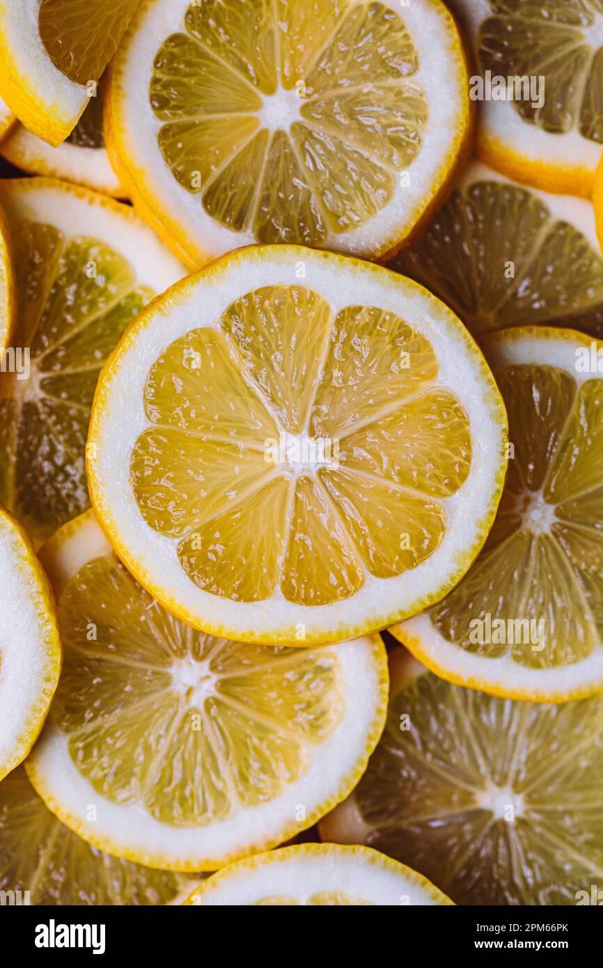 Lemon slices as a background Stock Photo - Alamy
