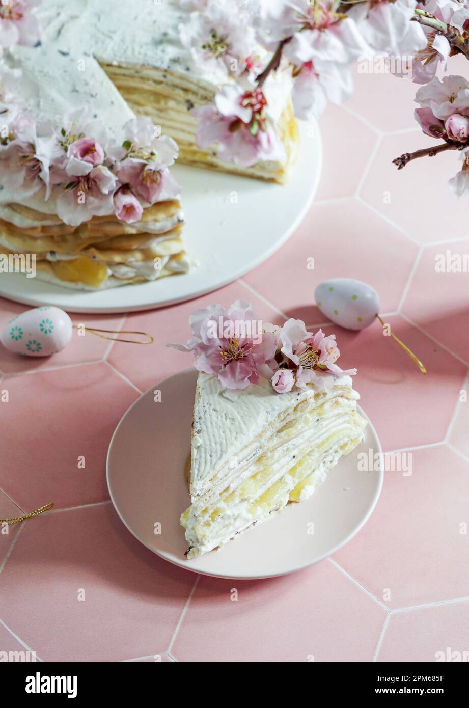 crepe cake or blini cake for Easter party, rose pink background, almond ...