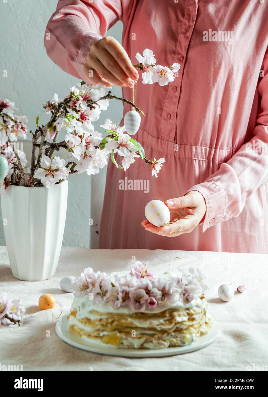 crepe cake or blini cake for Easter party, rose pink background, almond ...
