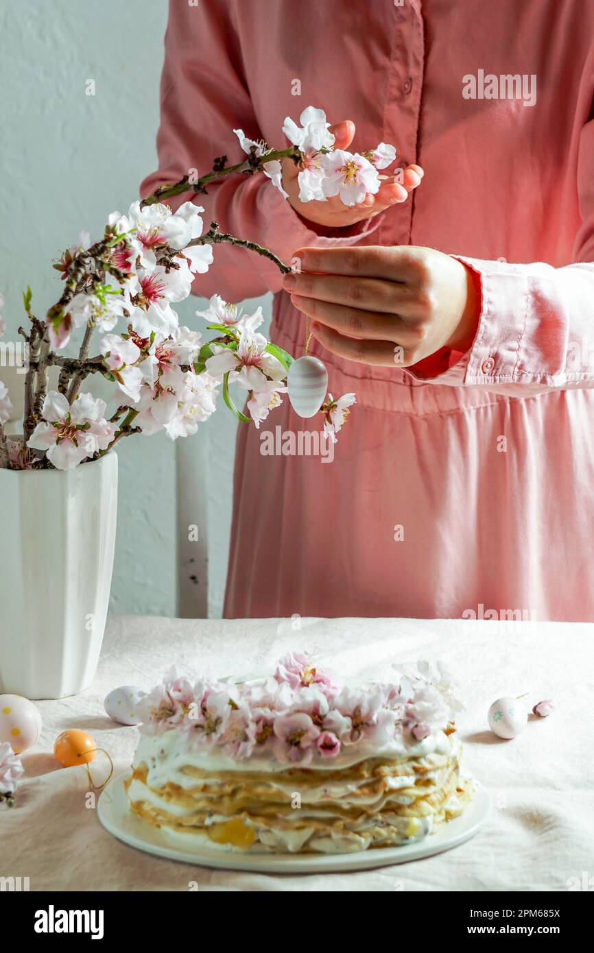 crepe cake or blini cake for Easter party, rose pink background, almond ...