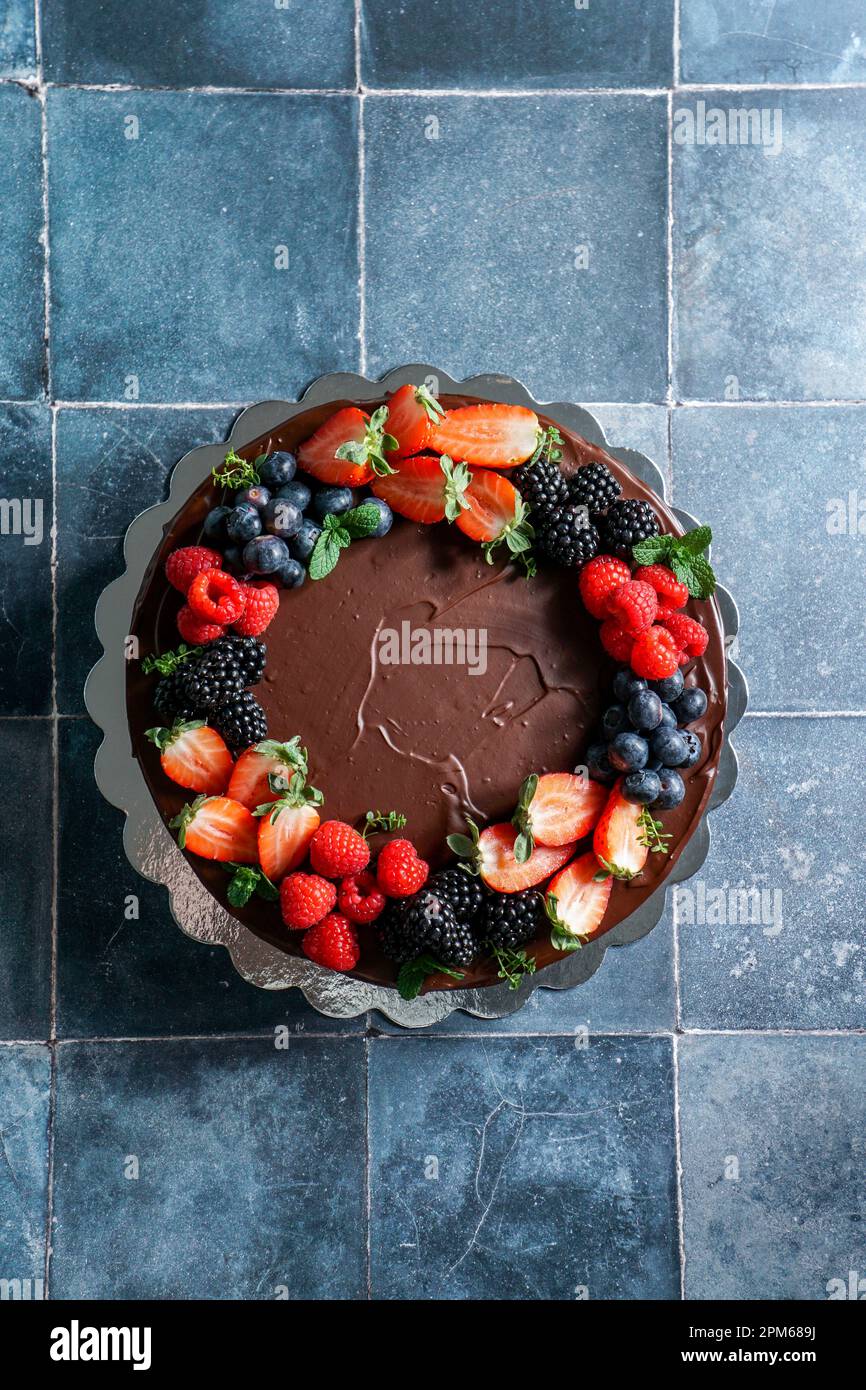 Homemade chocolate cake with fresh berries Stock Photo - Alamy