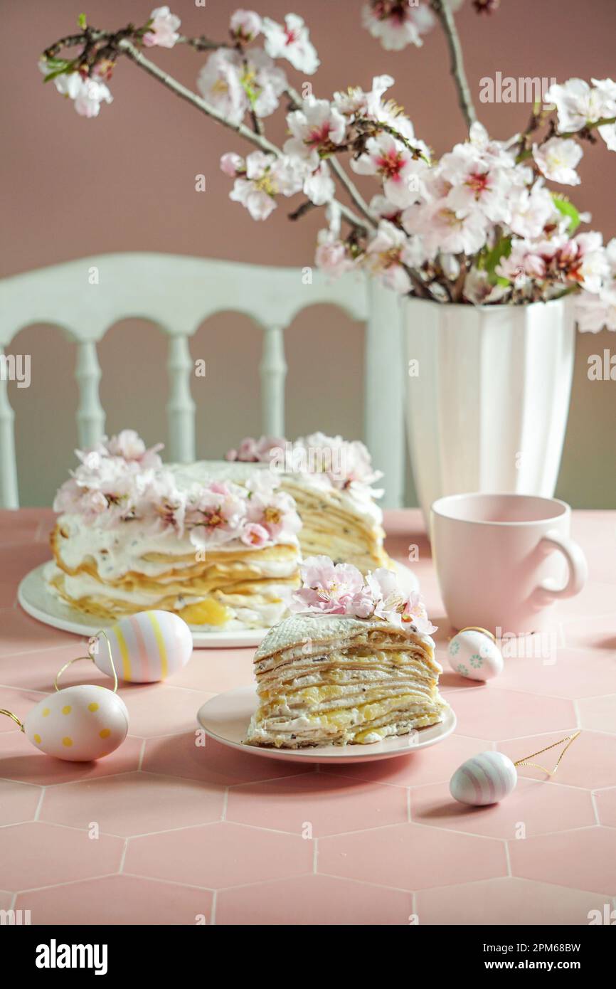 crepe cake or blini cake for Easter party, rose pink background, almond ...