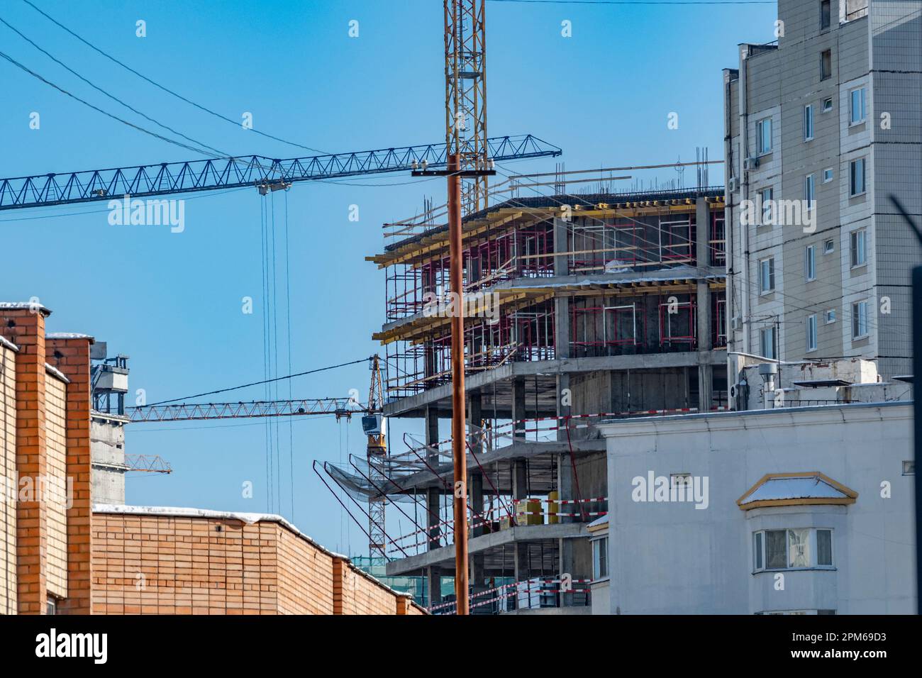 Russia, Moscow. A view of a multistorey building under construction ...