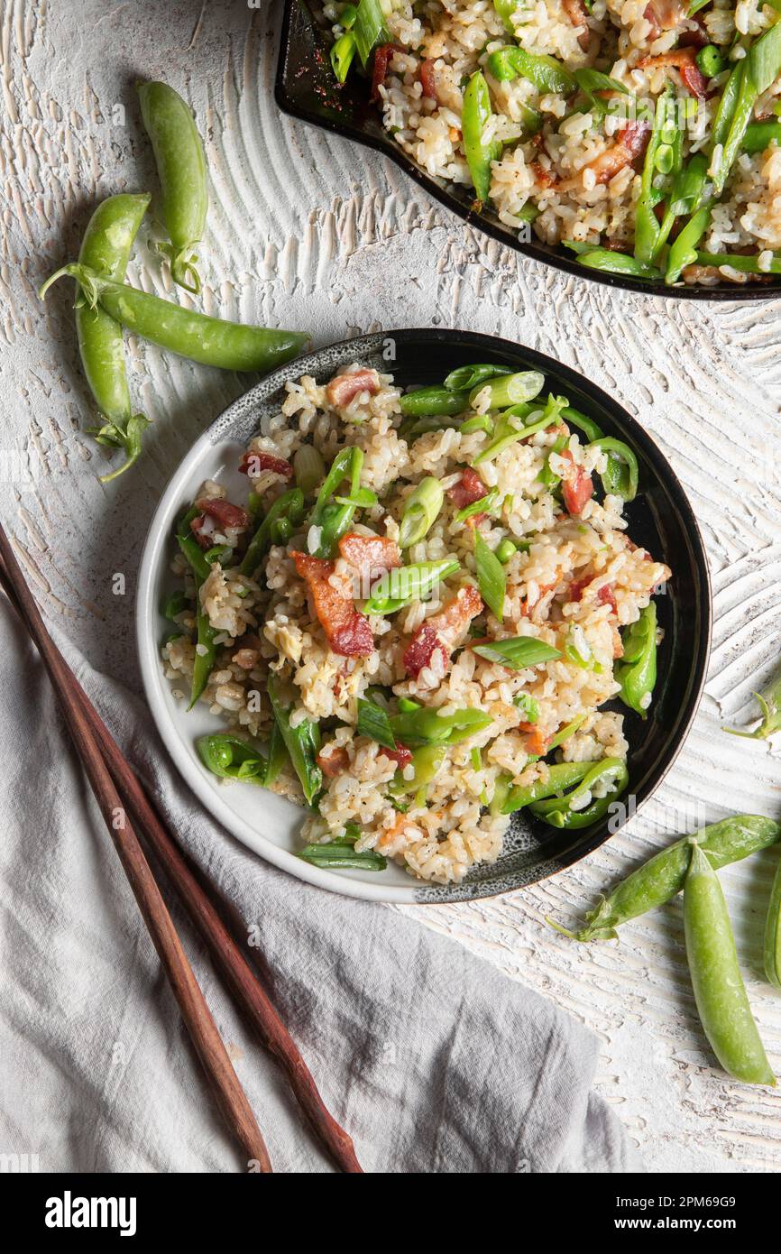 Bacon Snap Pea Fried Rice Stock Photo - Alamy