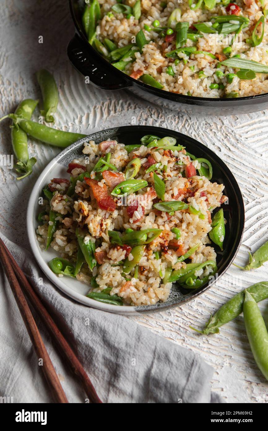 Bacon Snap Pea Fried Rice Stock Photo - Alamy