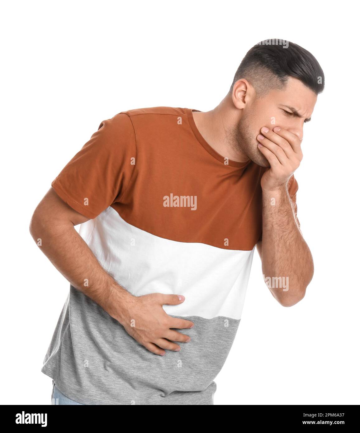 Man suffering from stomach ache and nausea on white background. Food ...