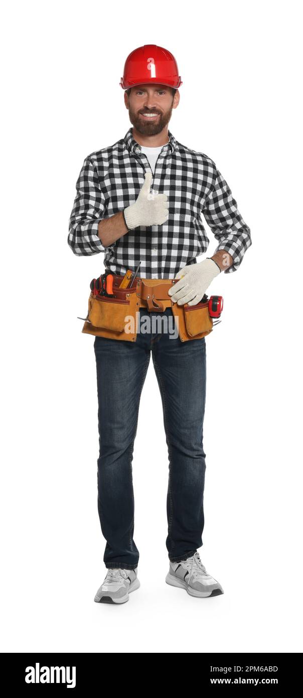 Professional builder in hard hat with tool belt isolated on white Stock ...