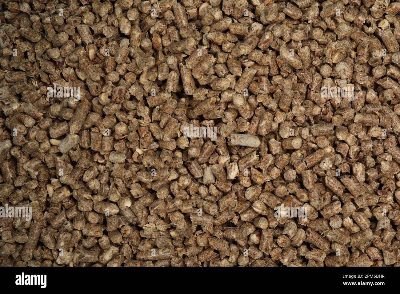 Wood pellet cat litter as background, closeup Stock Photo - Alamy