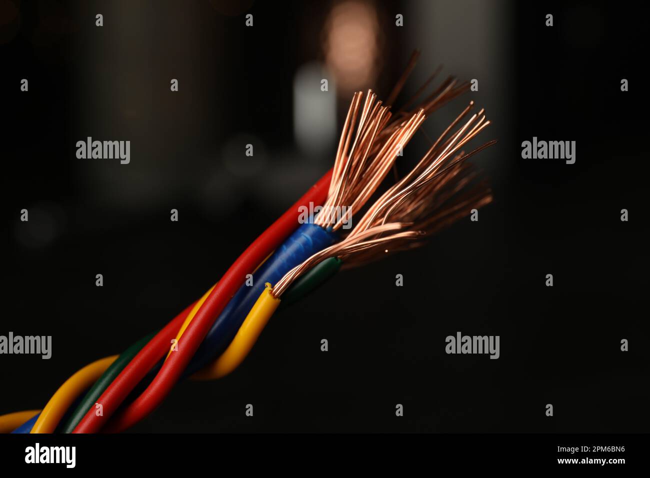 Electric wires on blurred background, closeup view Stock Photo - Alamy