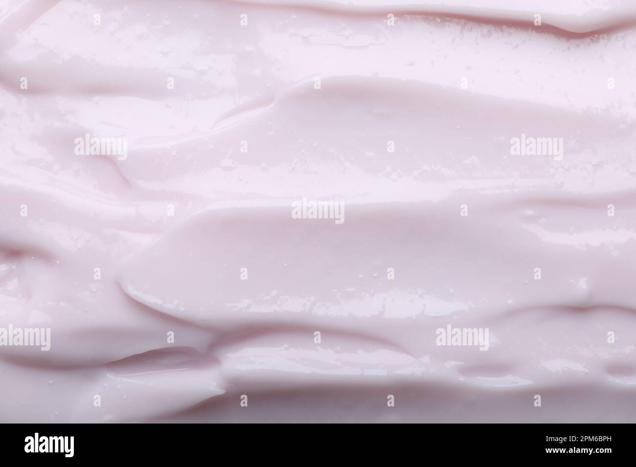 Closeup view of light pink body cream as background Stock Photo - Alamy