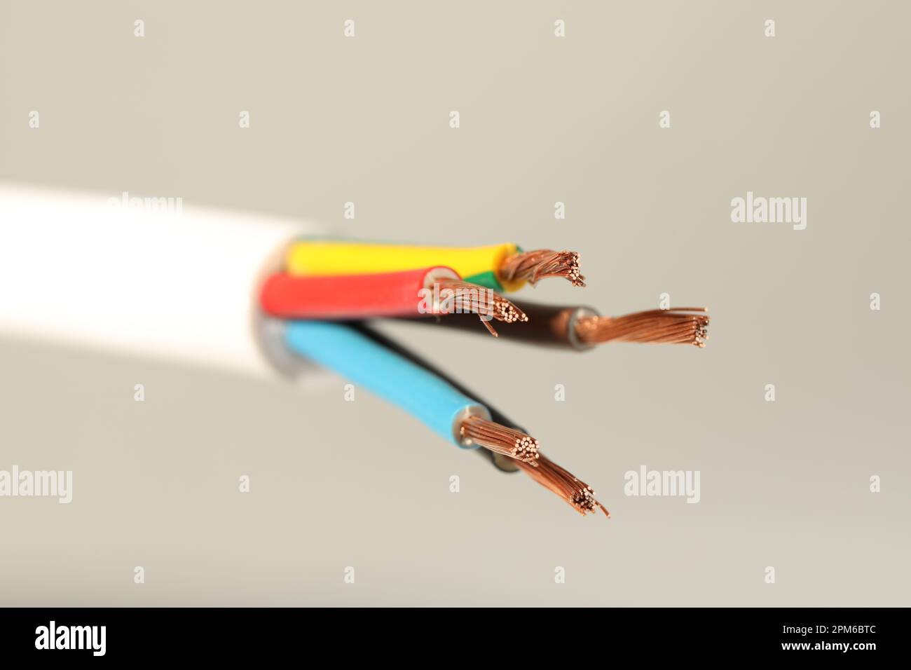 Electrical wires on light background, closeup view Stock Photo - Alamy