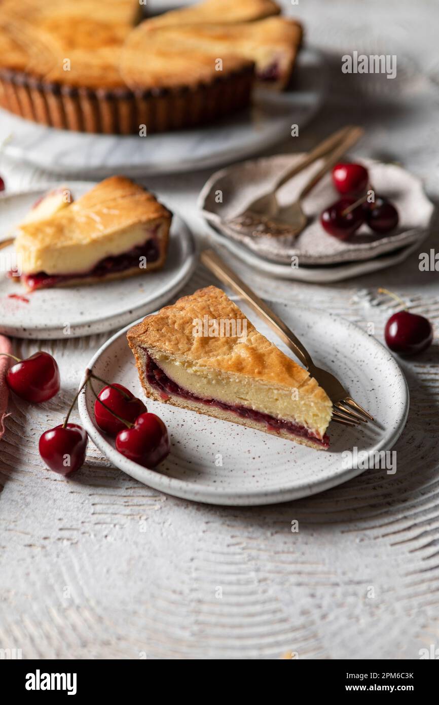 Gateau Basque with Vanilla Custard and Cherry Compote Stock Photo - Alamy