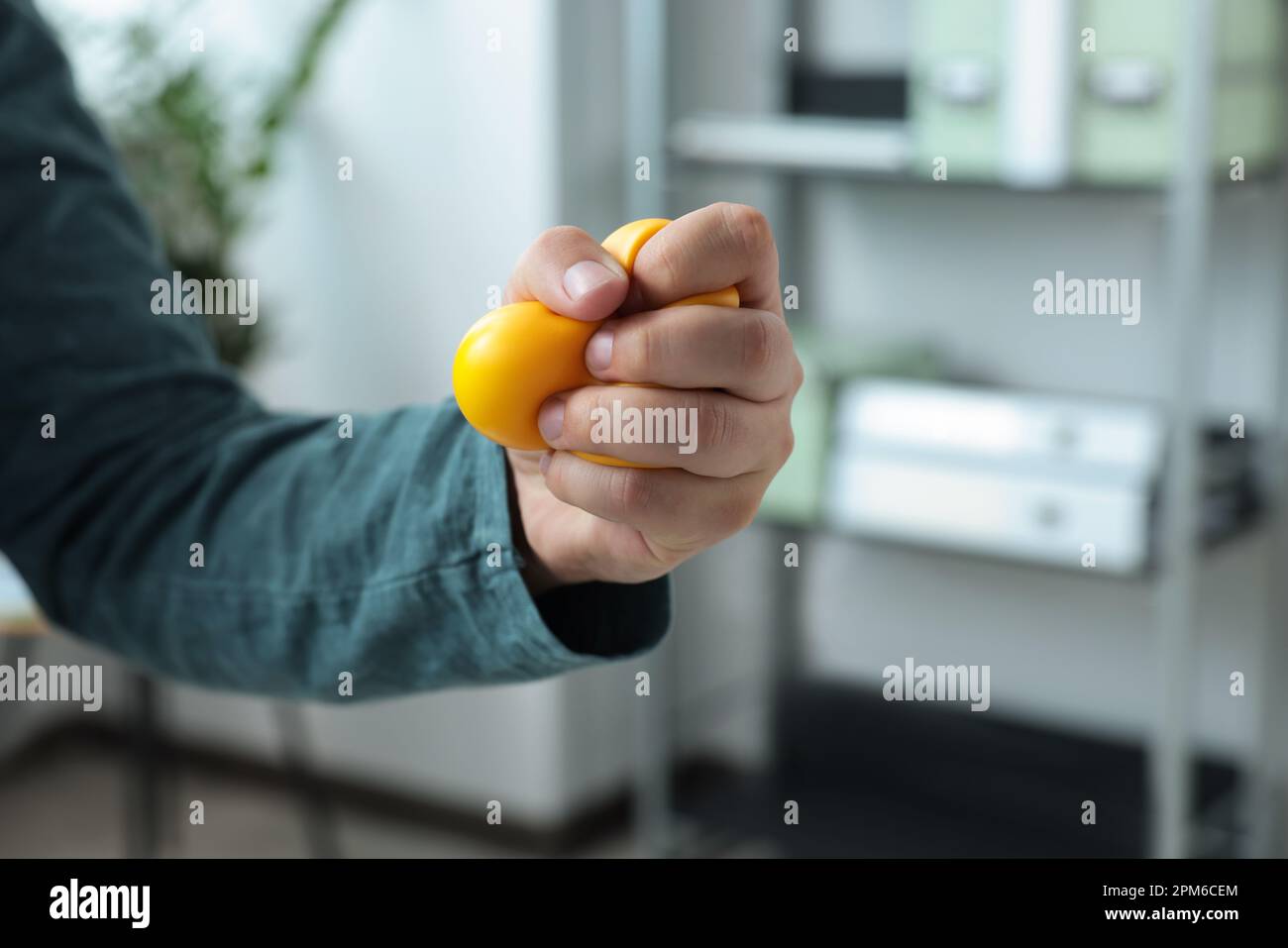 Stressball squeezing hi-res stock photography and images - Alamy