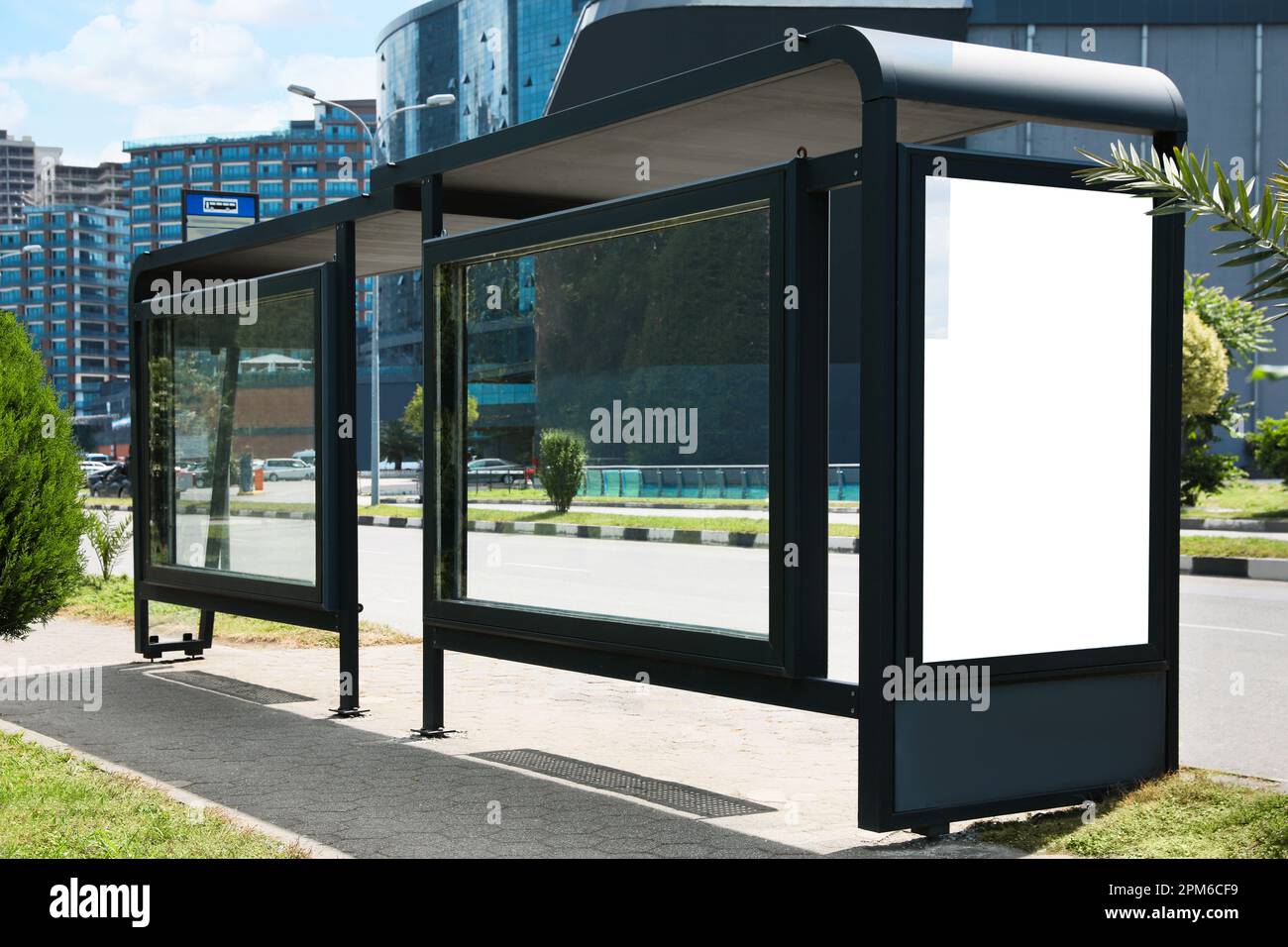 Modern public transport stop on city street Stock Photo - Alamy