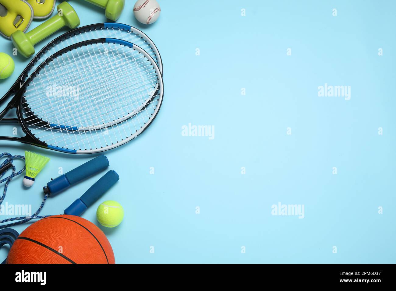 Set of different sports equipment on light blue background, flat lay ...