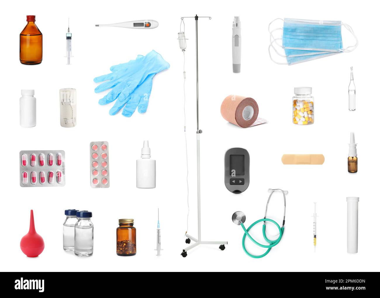 Set with drop counter stand and different medical equipment on white ...