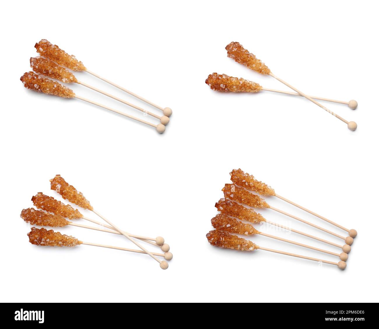 Set of wooden sticks with sugar crystals on white background. Tasty ...