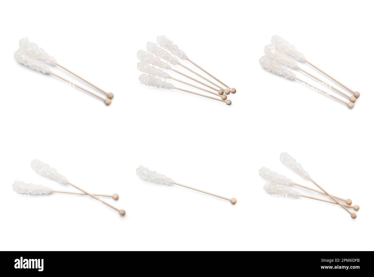 Set of wooden sticks with sugar crystals on white background. Tasty ...