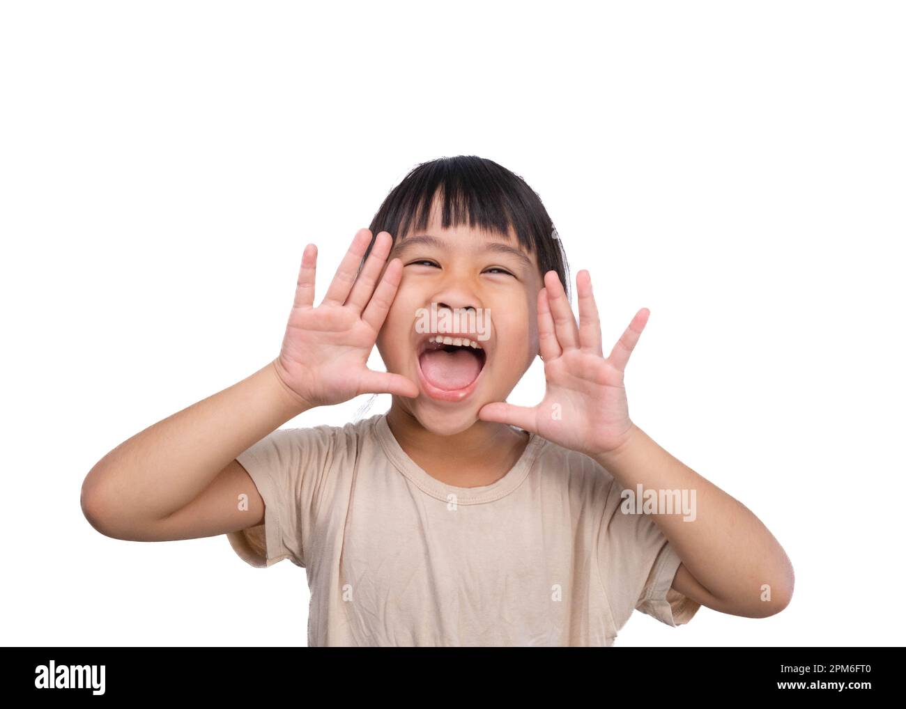 Cute little girl shouting and holding palm near mouth on white ...