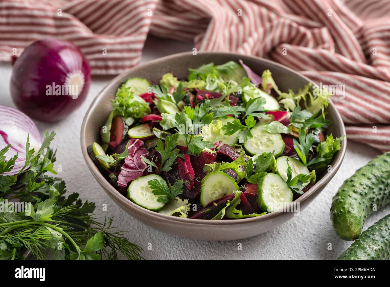 Cucumber and beetroot salad in a bowl Stock Photo - Alamy