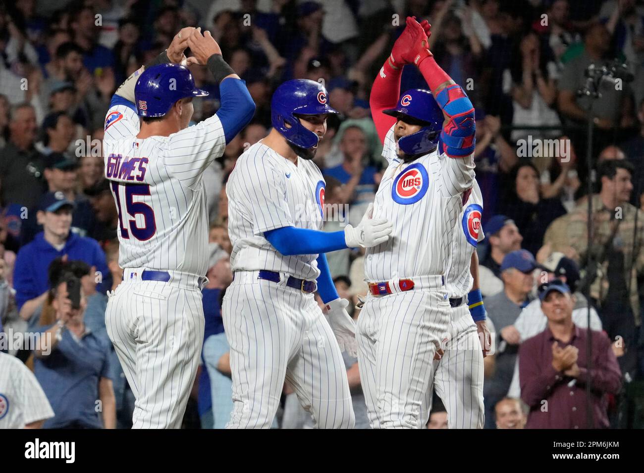 Chicago Cubs' Nelson Velazquez, right, celebrates with Yan Gomes, left ...