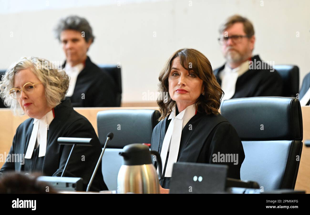 Justice Catherine Muir (centre) is seen at the Brisbane Supreme Court ...