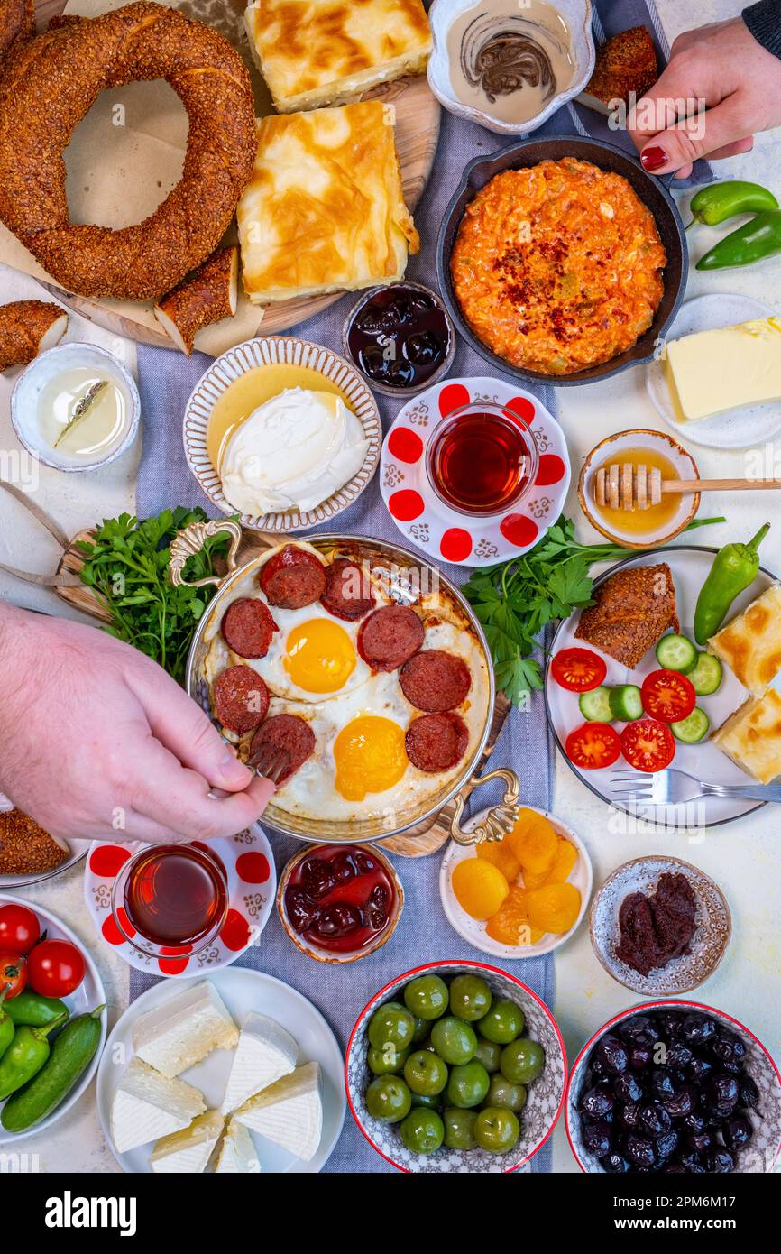 Top view of traditional Turkish breakfast table with pastries, jams ...