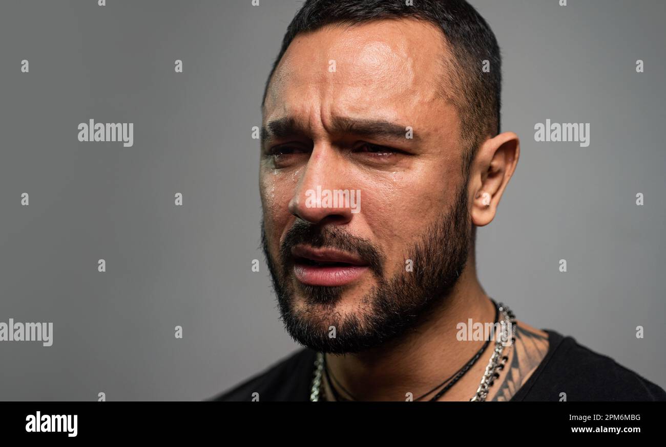 False imagination of masculinity. Crying man. Over-emotional situation ...