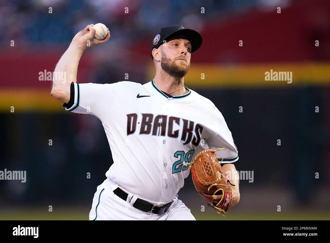 Arizona Diamondbacks starting pitcher Merrill Kelly throws to a ...