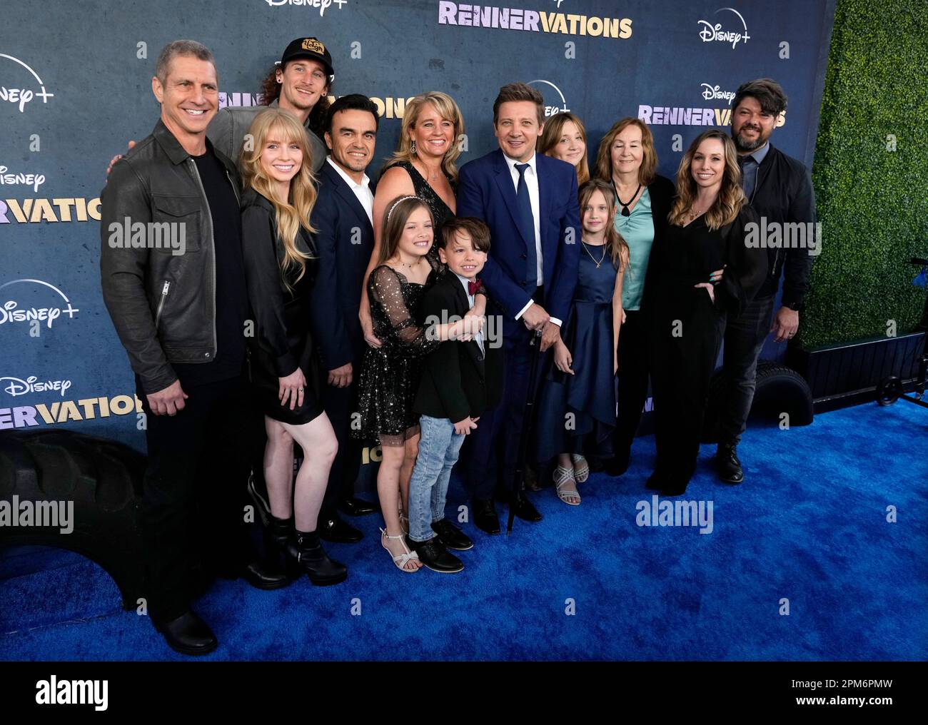 Jeremy Renner, center, the host and executive producer of ...