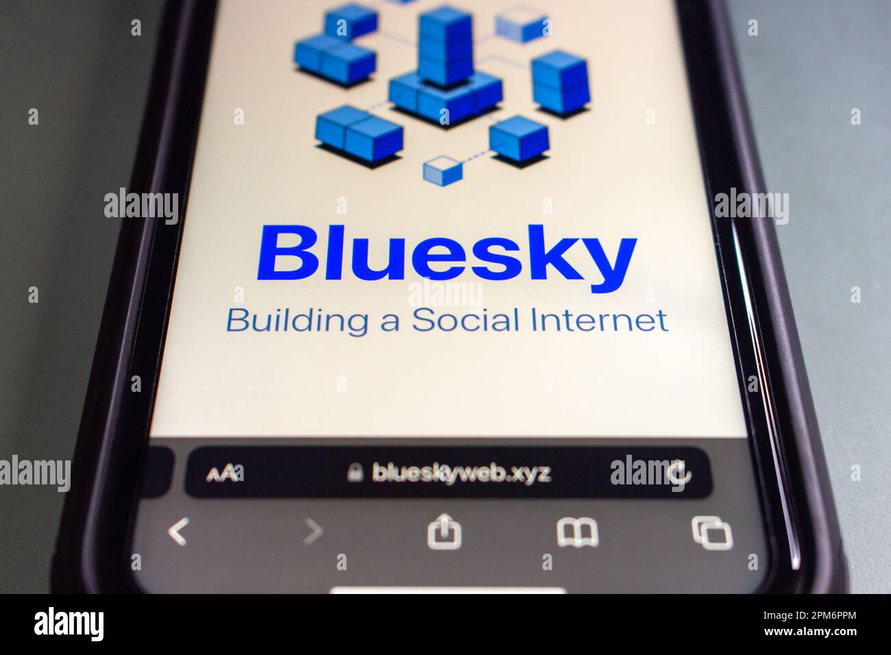 Website of Twitter alternative Bluesky Social seen in an iPhone screen ...