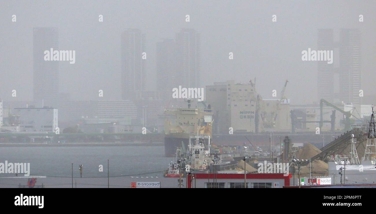 The townscape of Fukuoka is hazy due to yellow sand in Fukuoka City ...