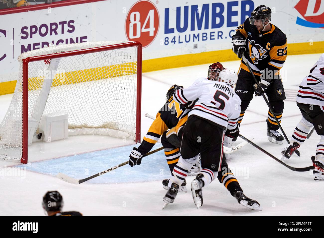 Pittsburgh Penguins' Evgeni Malkin (71) puts a shot behind Chicago ...
