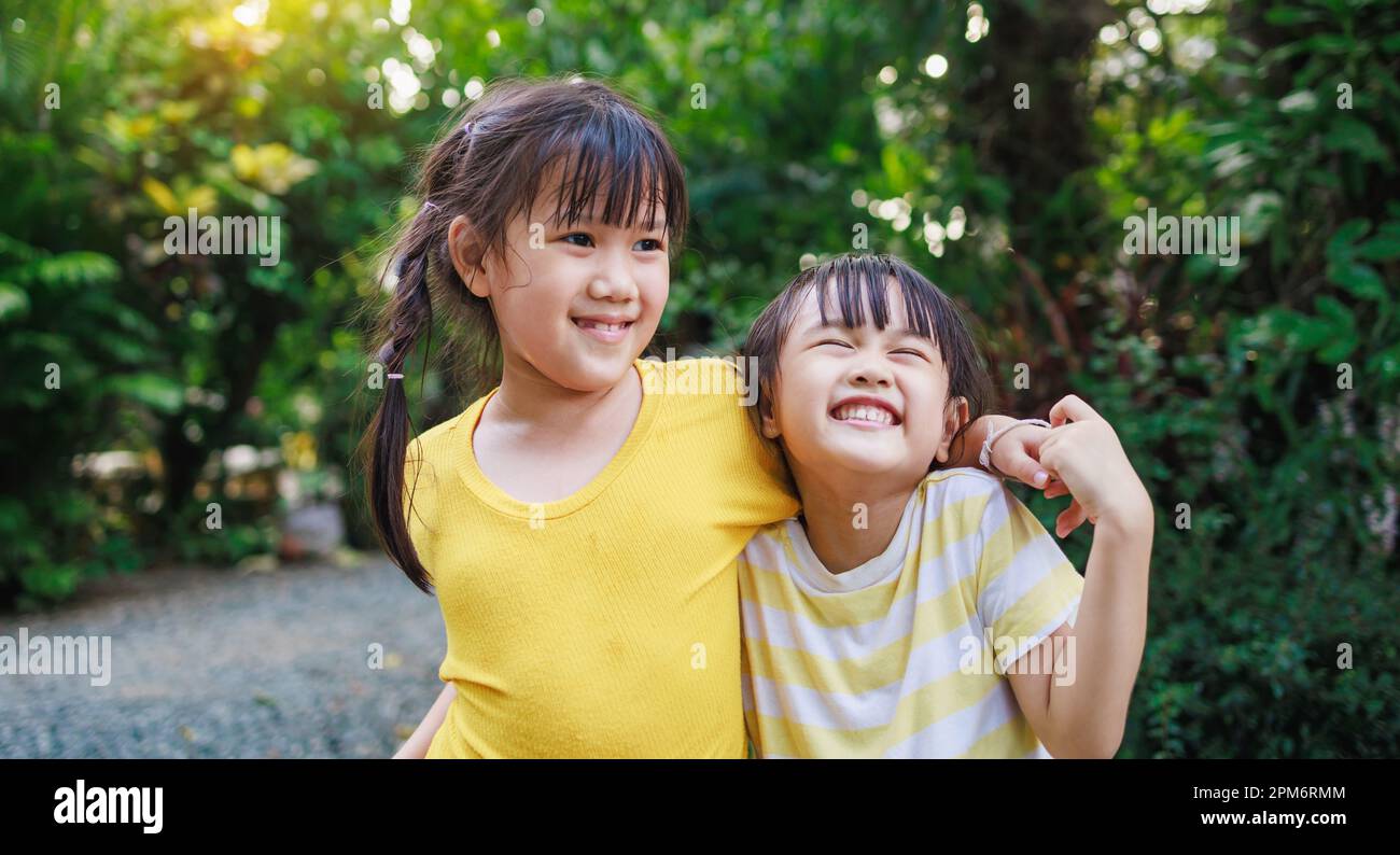 Portrait of emotional face expression of smiling and laughing of Asian ...