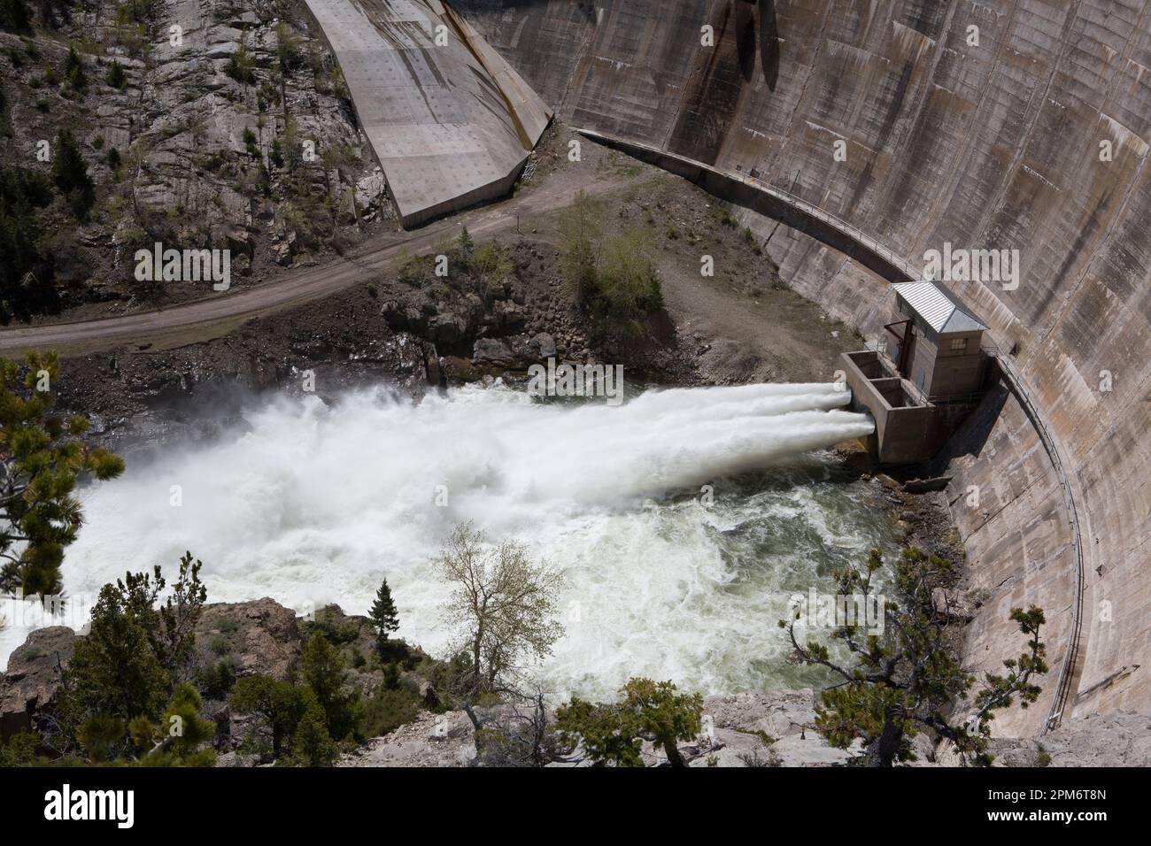 Spring runoff water jets from the two 72 inch outlets at the bottom of ...