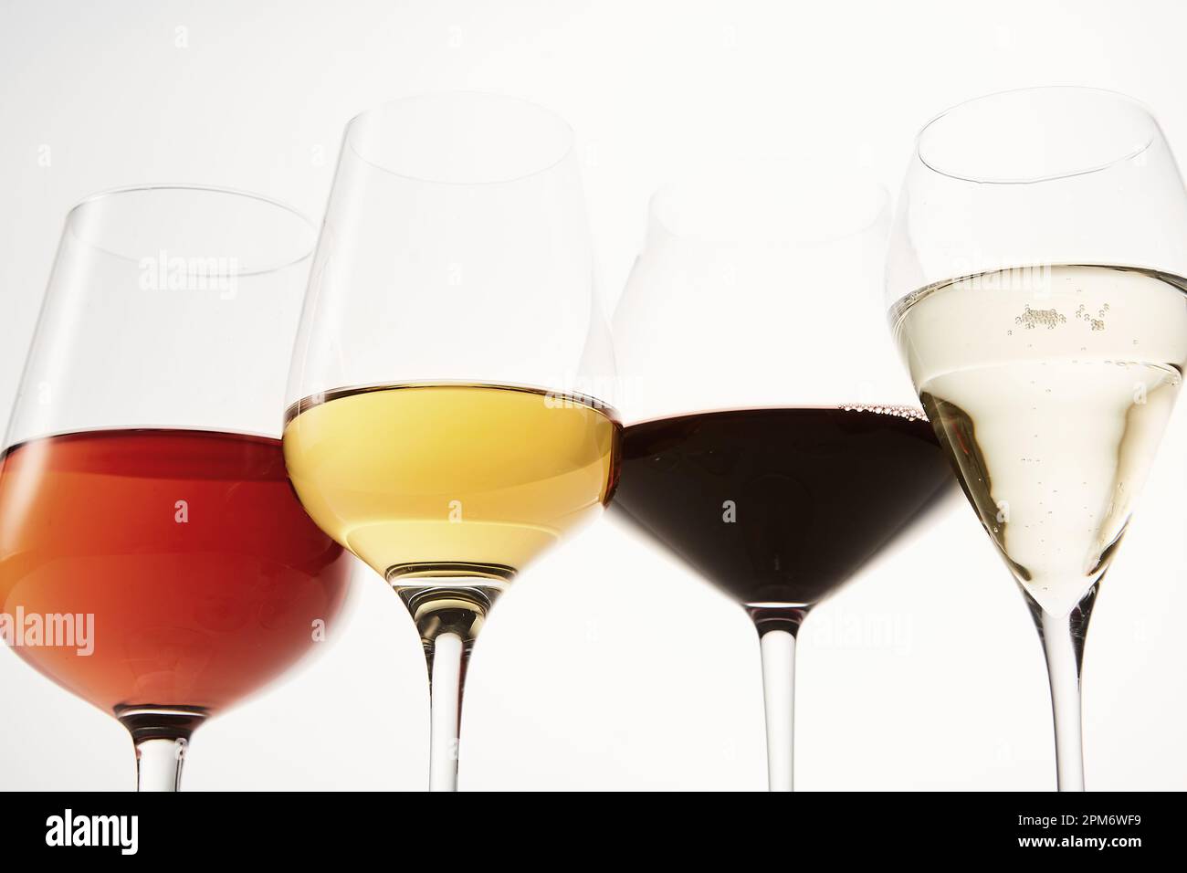 Pink, white, red, sparkling alcoholic drinks in wine glasses Stock ...