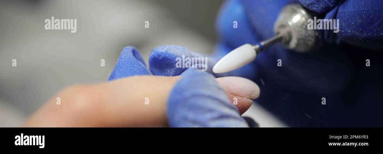 Female manicurist doing manicure hardware hi-res stock photography and ...