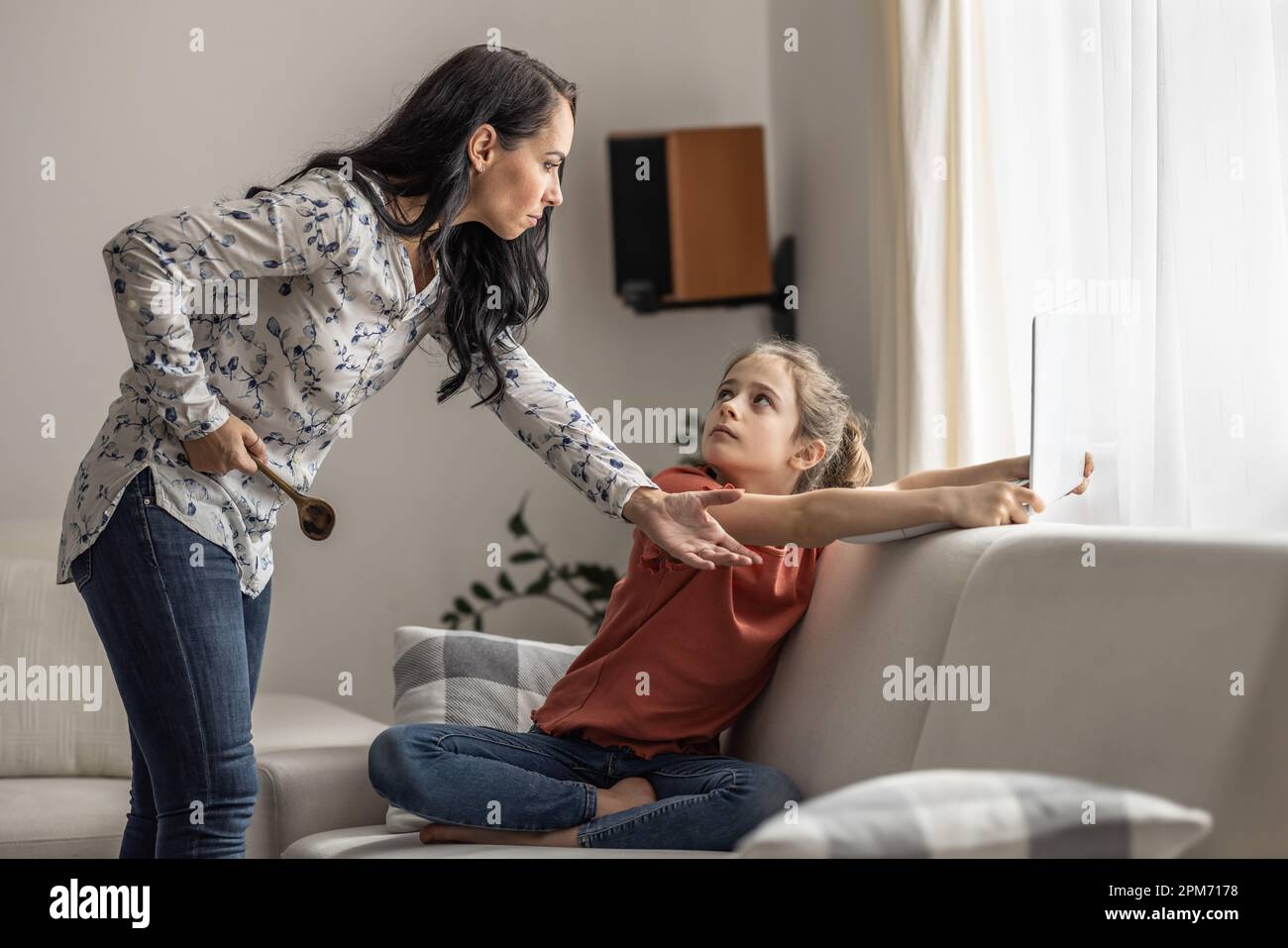 Stuborn preteen girl refuses to give her computer away to her mother ...