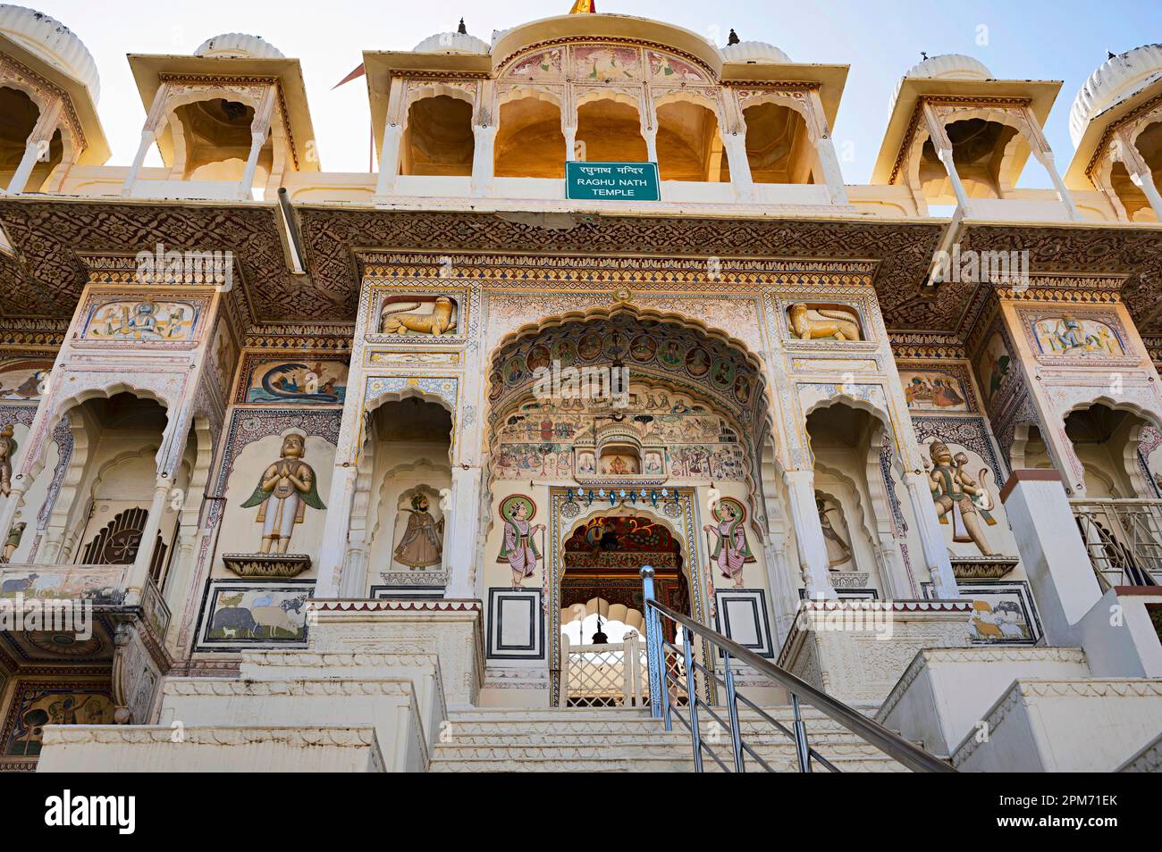 Colourful paintings on the entrance gate of Raghu Nath Ji Mandir ...