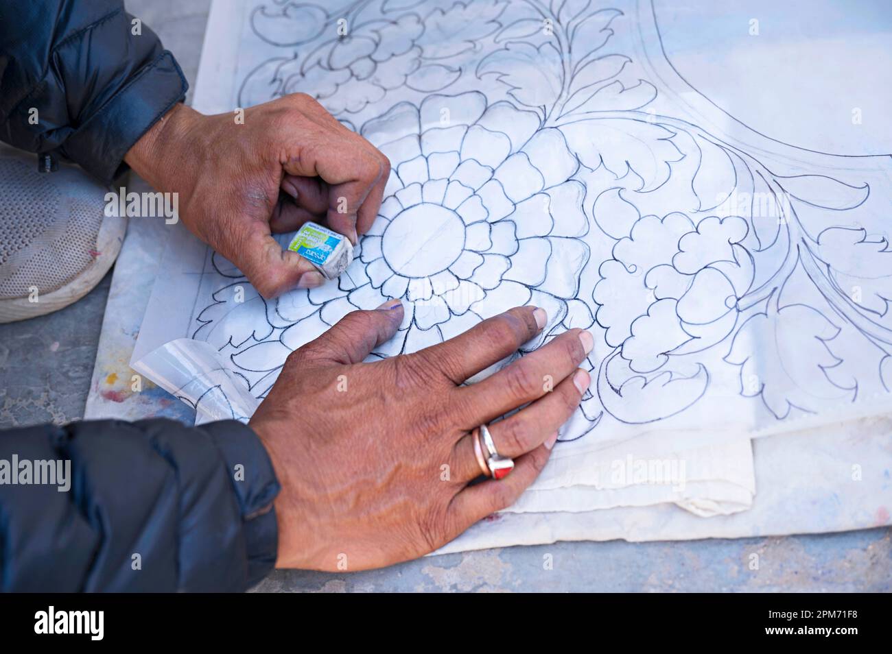Local man tracing the drawing for a Shekhawati wall painting, near ...