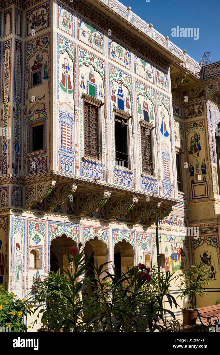 Colourful paintings and wooden windows on the outer wall of Seth ...