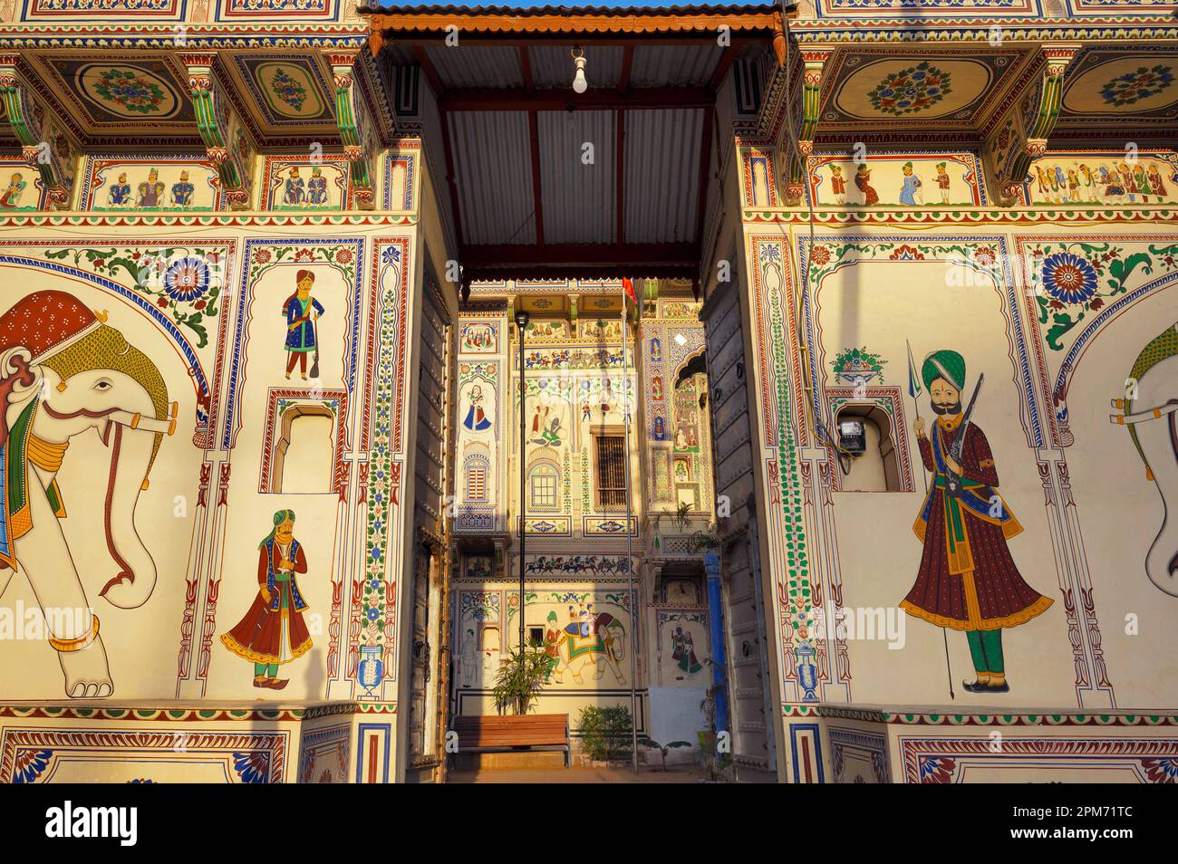 Colourful paintings on the outer wall of an entrance of Seth Harmukhrai ...