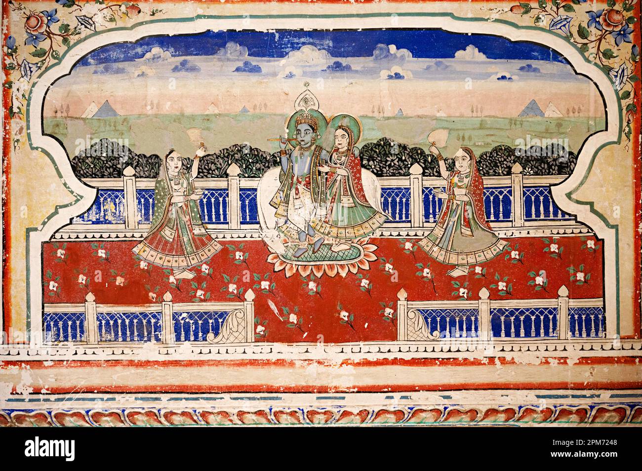 Colourful painting of Lord Shrikrishna with Radha on the inner wall of ...